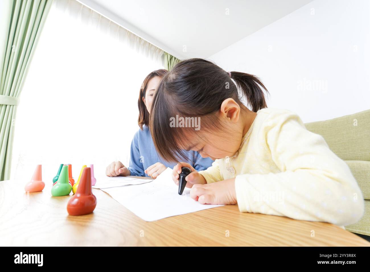 Parent and child drawing Stock Photo - Alamy