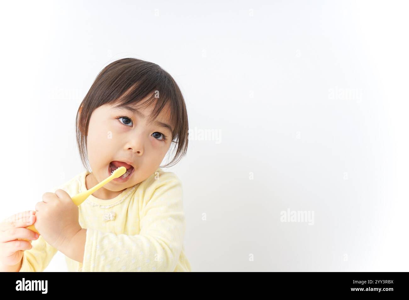 Child brushing teeth Stock Photo - Alamy