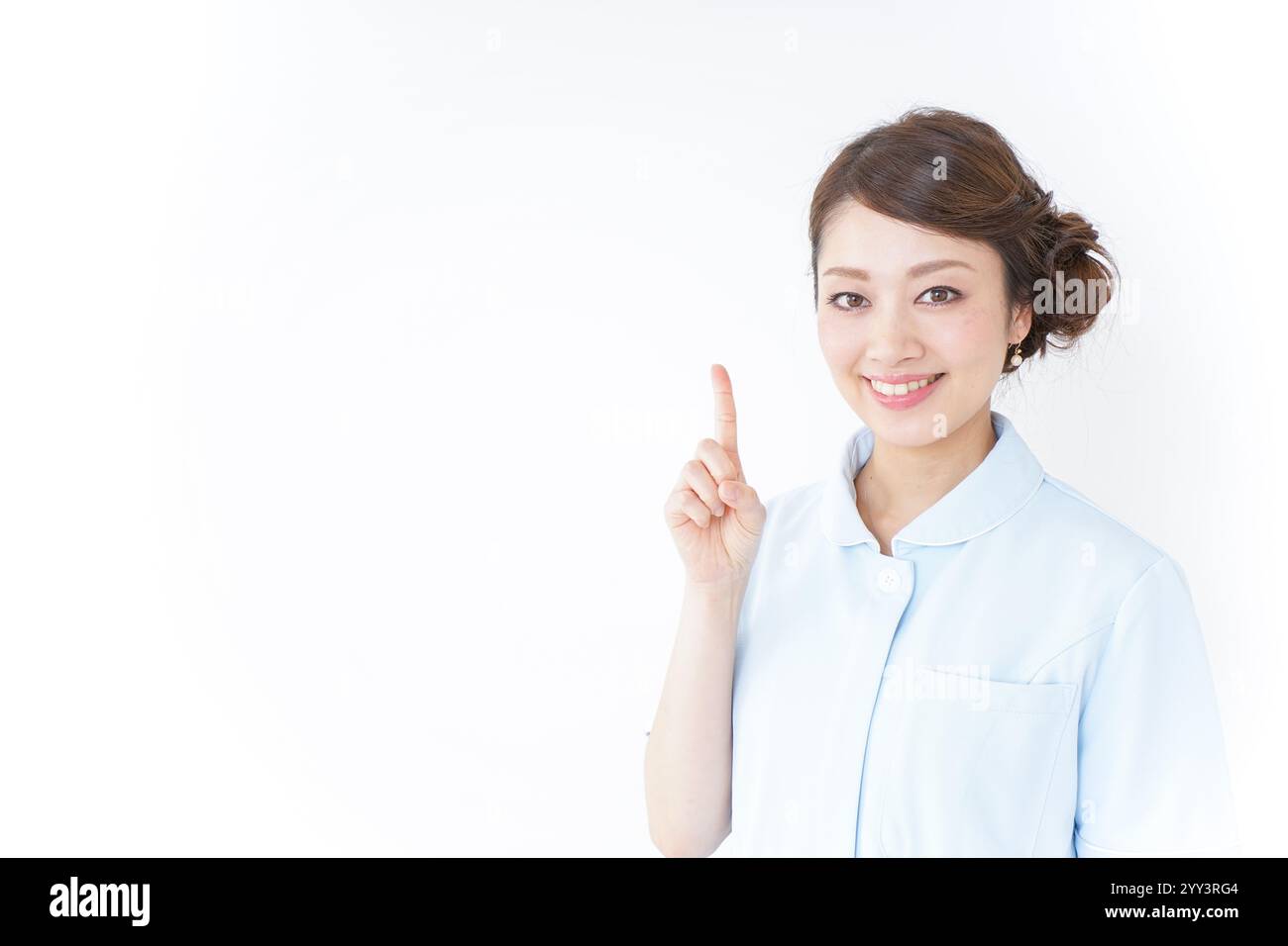 Nurse pointing finger Stock Photo - Alamy