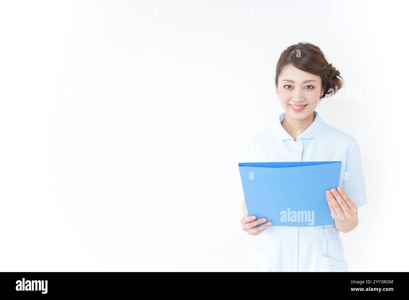 Nurse holding papers Stock Photo - Alamy