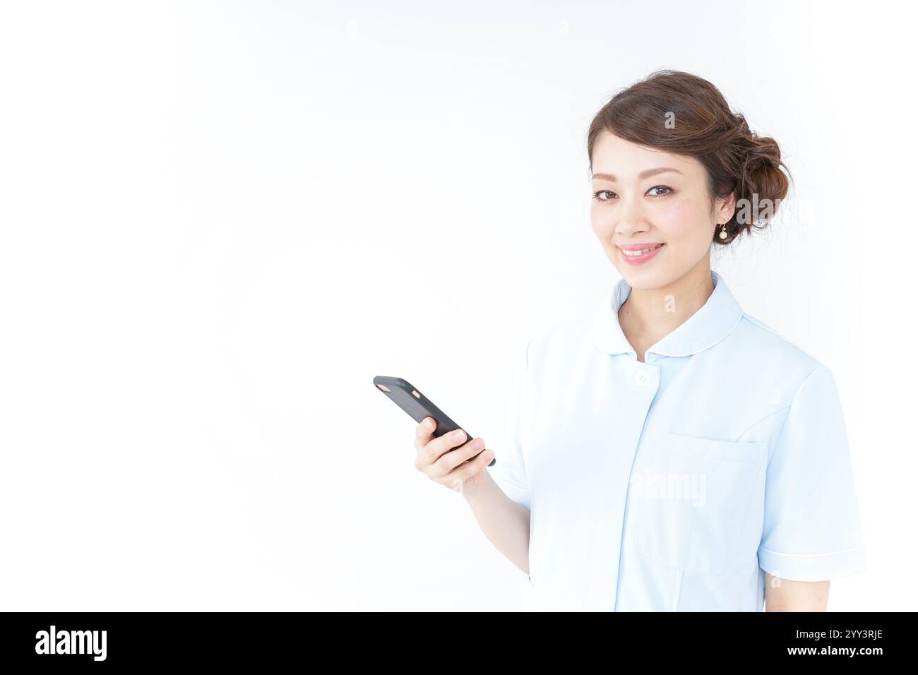 Female doctor nurse smartphone hi-res stock photography and images - Alamy