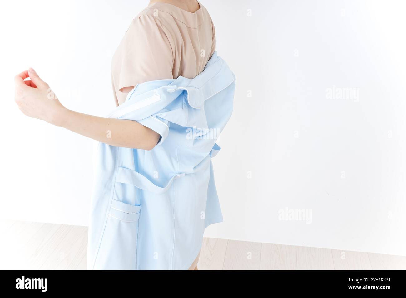 Nurse changing clothes Stock Photo - Alamy