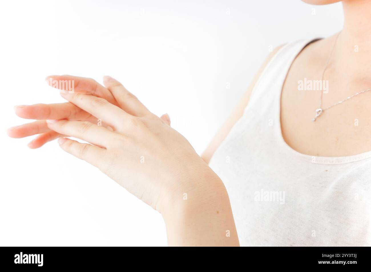 Woman giving hand care Stock Photo - Alamy