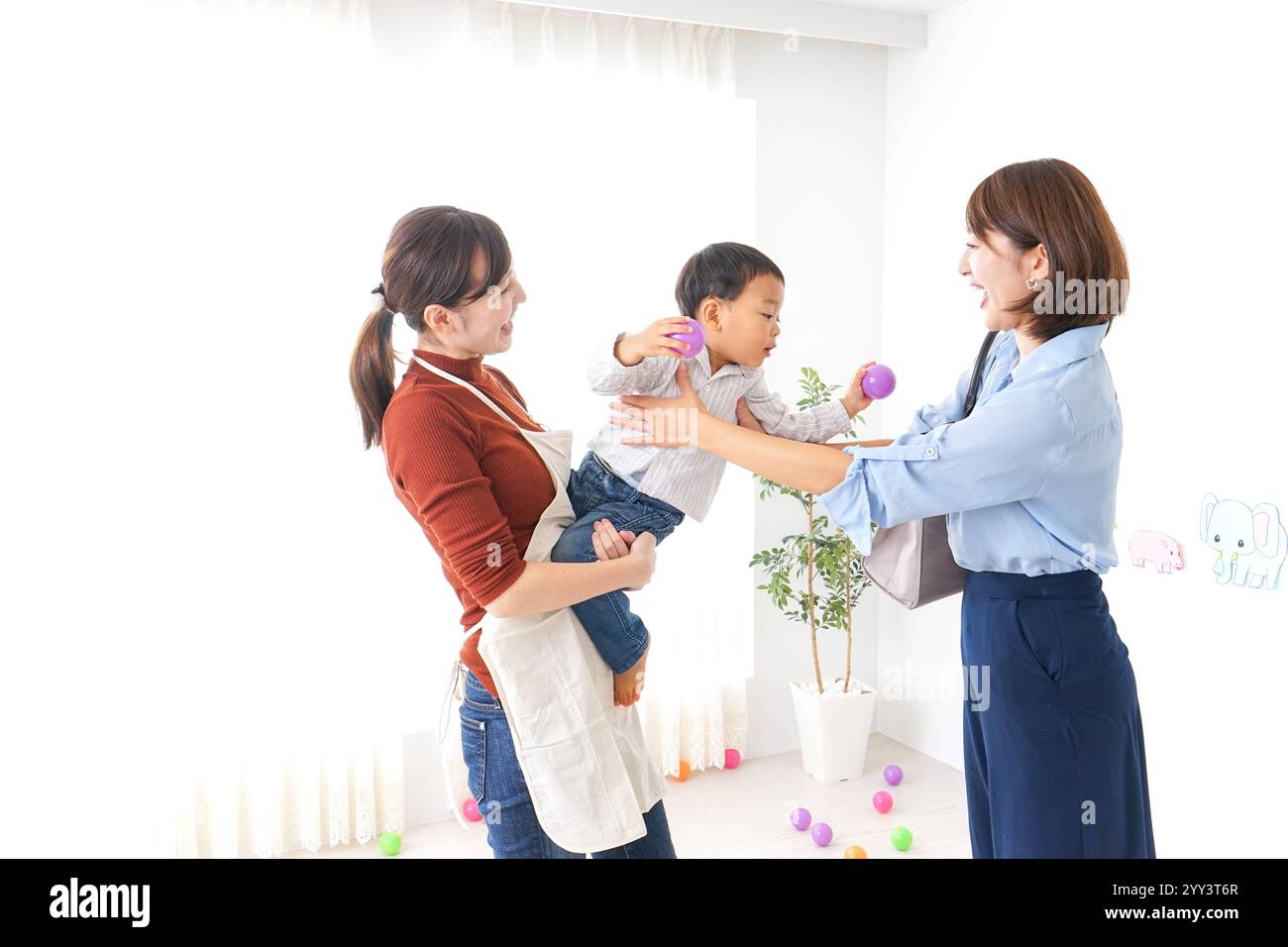 Mother picking up her child from kindergarten Stock Photo - Alamy