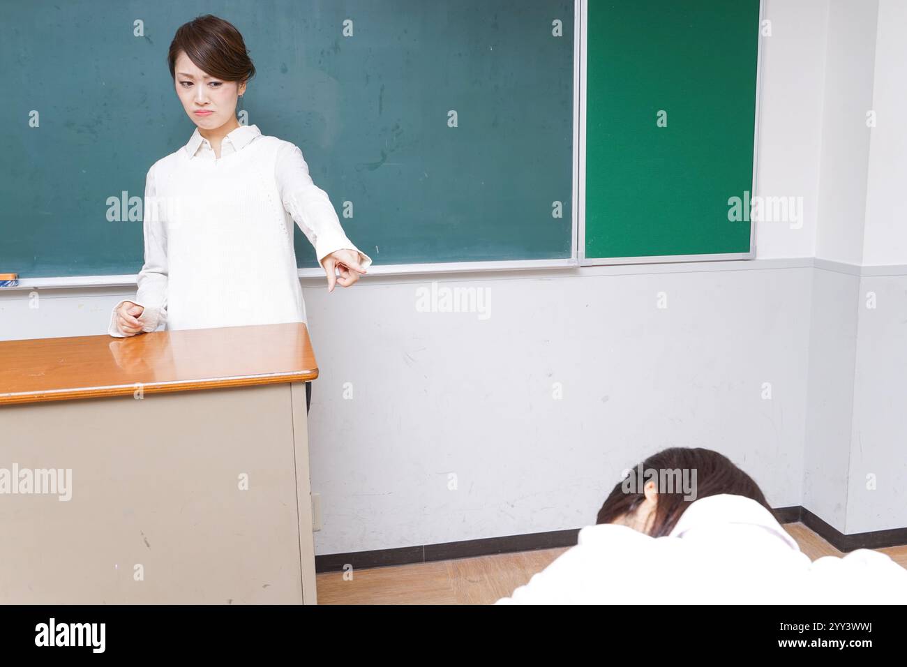 Angry teacher scold girl student hi-res stock photography and images ...