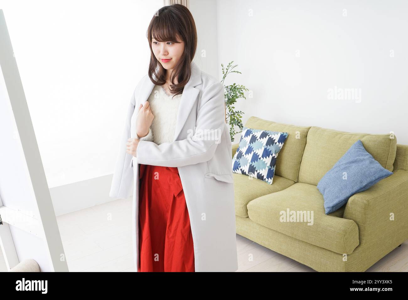 Woman dressing up Stock Photo - Alamy