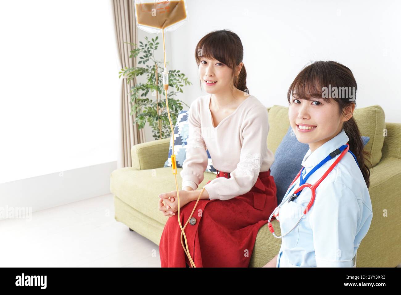 Patients receiving treatment at home and visiting nurses Stock Photo ...