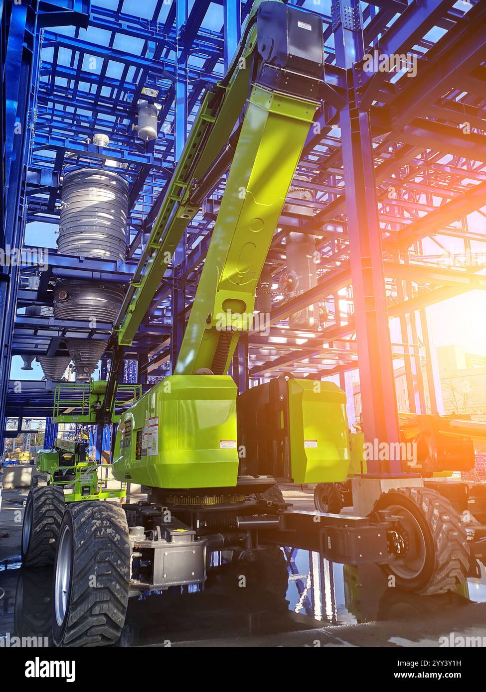 Heavy machinery involved in the process steel structure is under ...