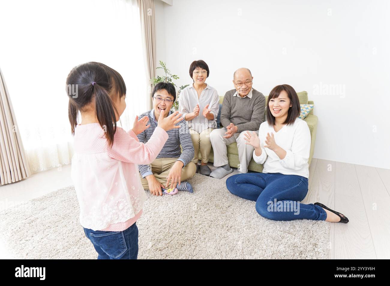 Children performing a play and their close family friends Stock Photo ...