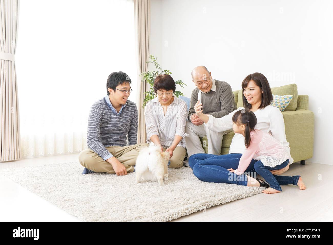Two generations of a family hi-res stock photography and images - Alamy