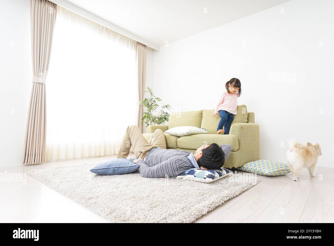 Fathers raising children Stock Photo - Alamy