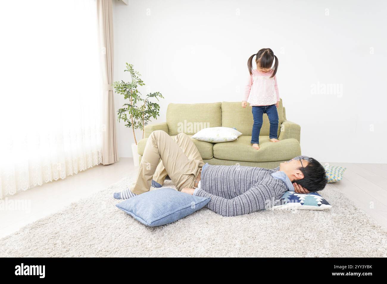 Fathers raising children Stock Photo - Alamy