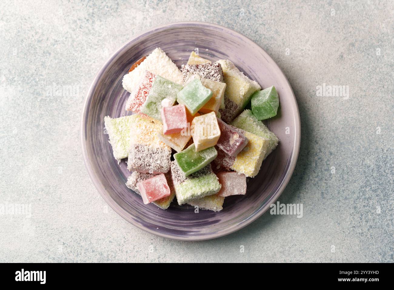 Colorful cubes of traditional Turkish delight arranged on a decorative ...
