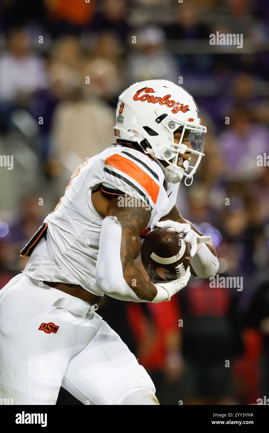 Oklahoma State running back Ollie Gordan II (0) carries the ball during ...