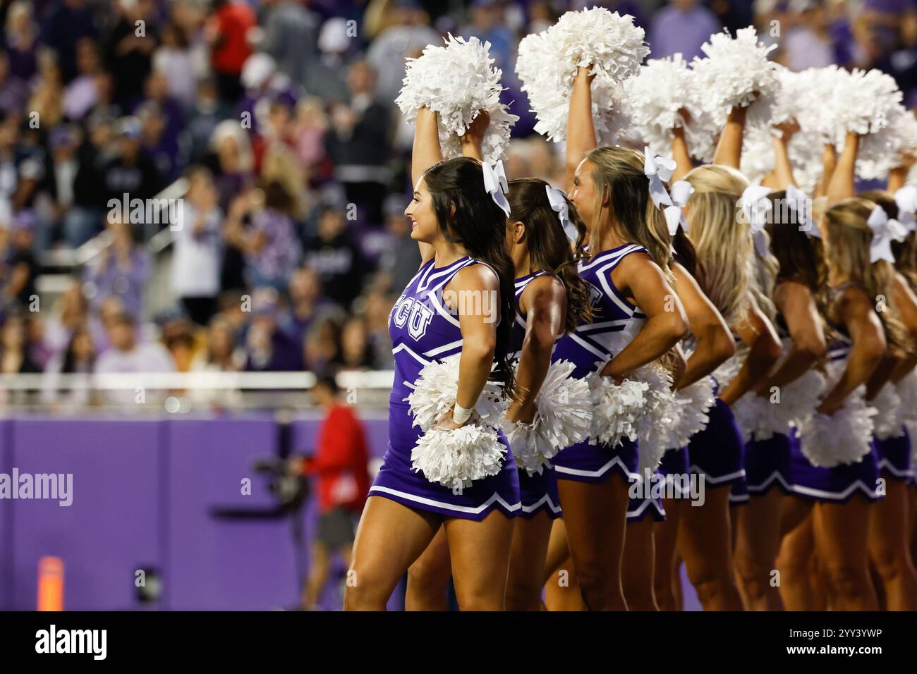 TCU cheerleaders cheer after a score during an NCAA college football ...