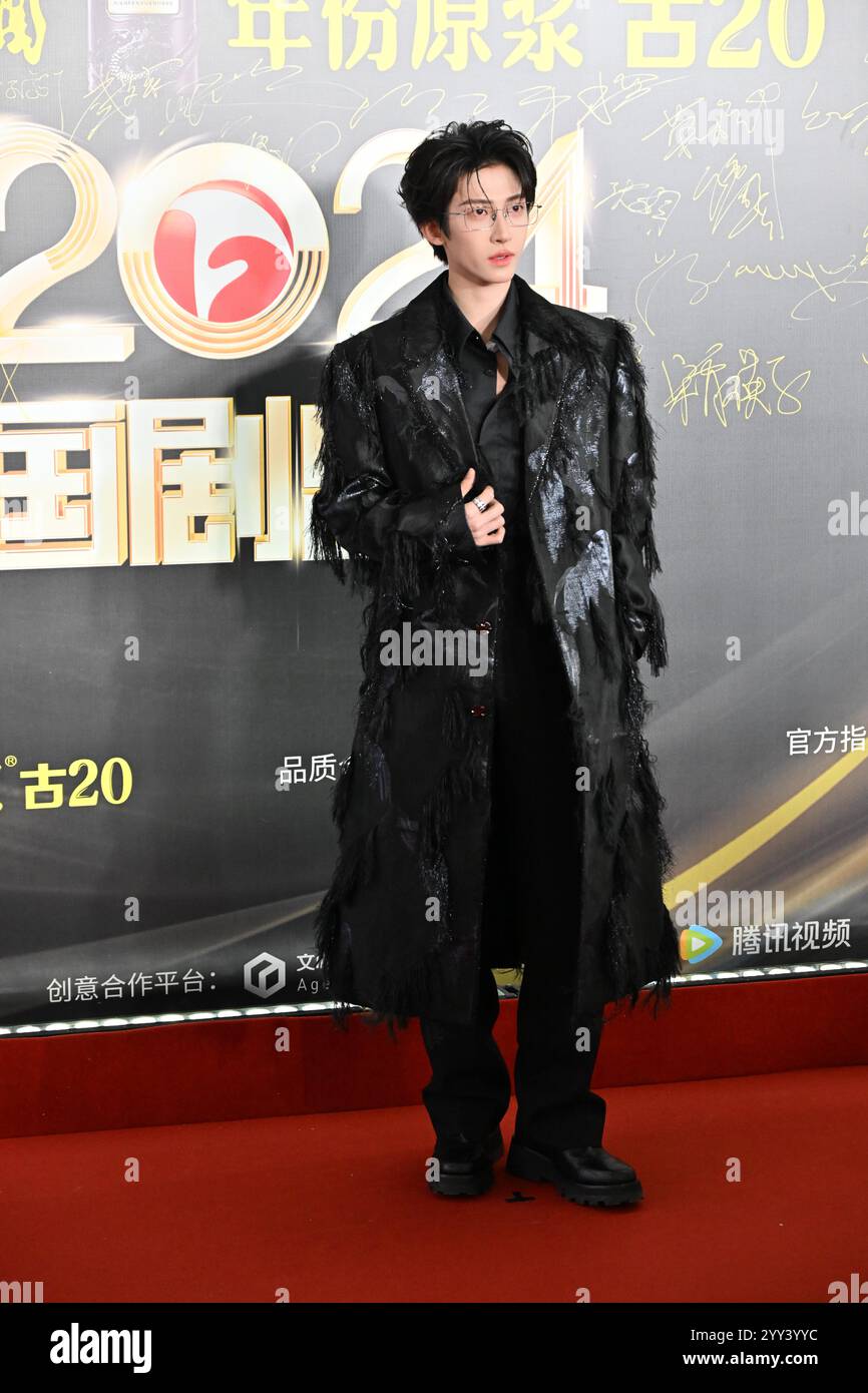 Chinese singer, dancer and model Liu Yu attends an activity in Beijing ...