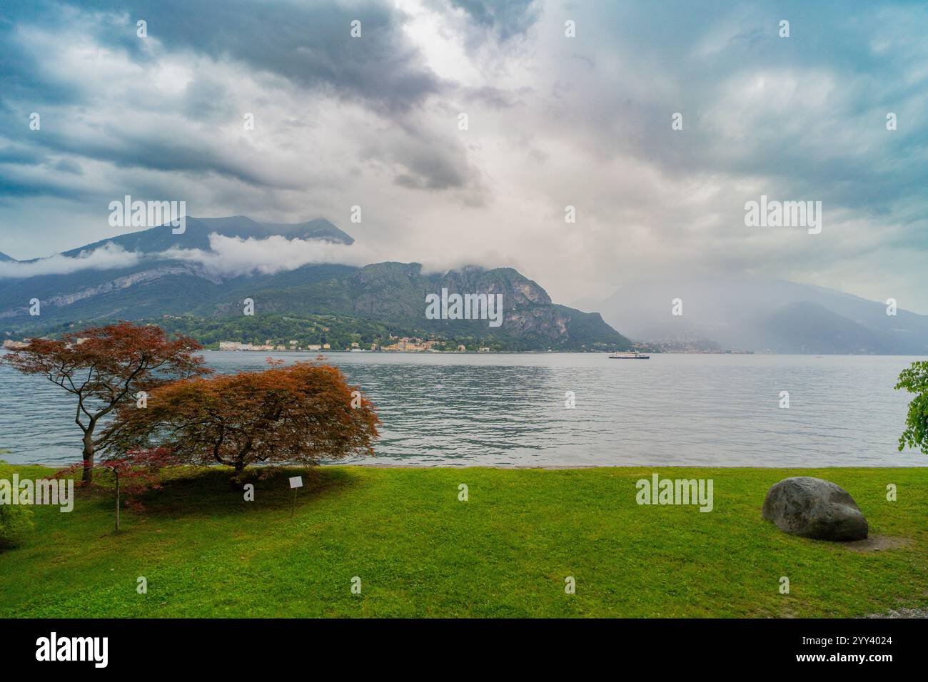 Towering mountains surround serene hi-res stock photography and images ...