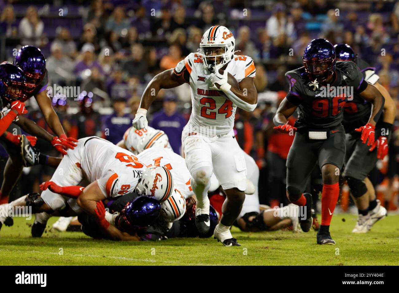 Oklahoma State running back Trent Howland (24) carries the ball during ...