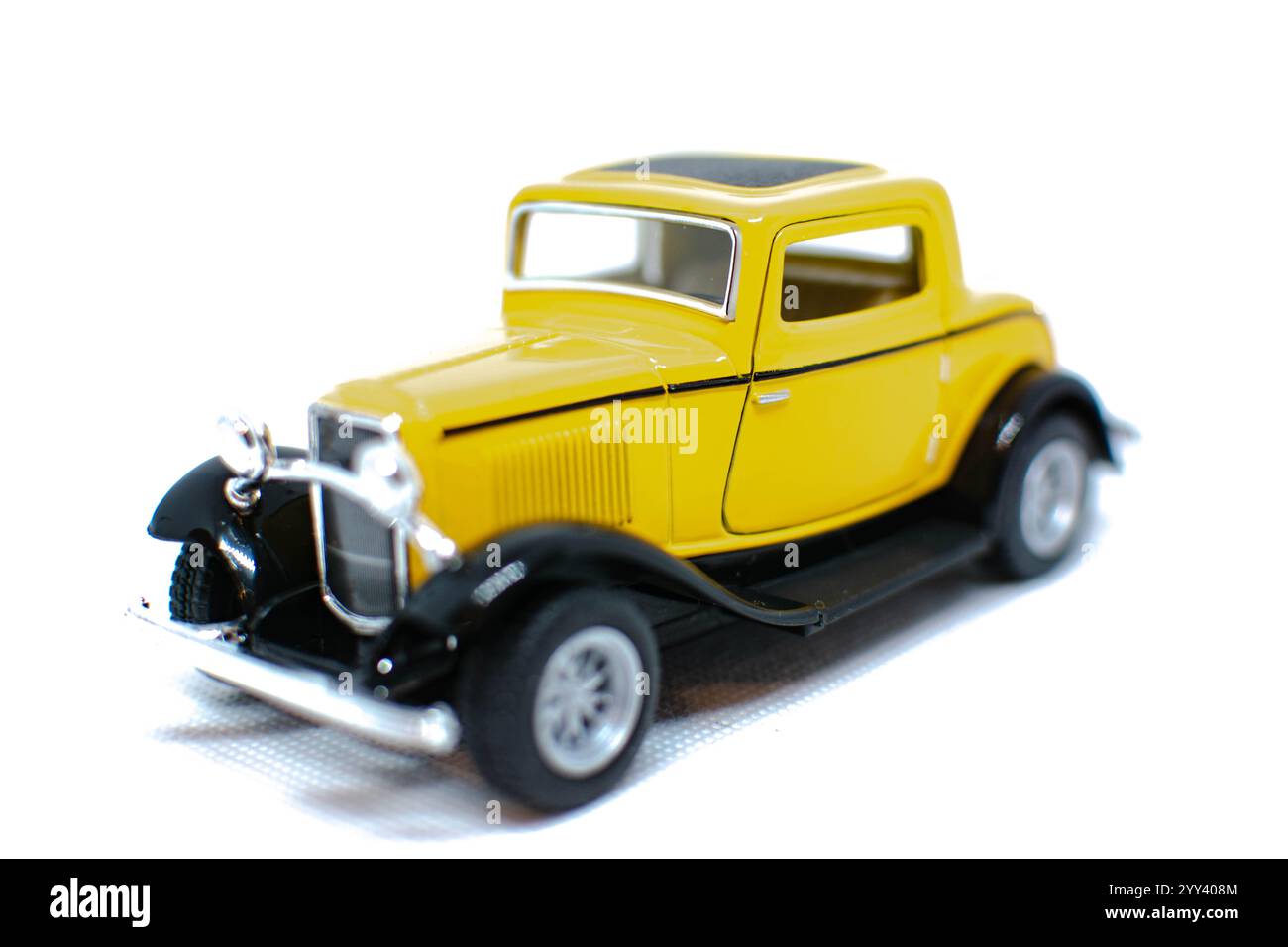Retro car from the side. Beautiful classic yellow car. Nice antique ...