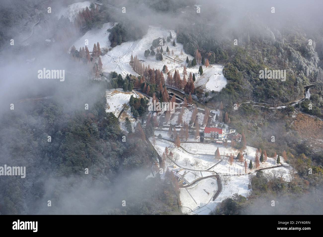 An aerial photo shows Mt. Rokko covered in snow in Kobe City, Hyogo ...