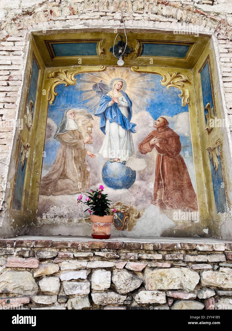 Assisi, Italy - July 05, 2022: A detailed fresco showcasing an angelic ...