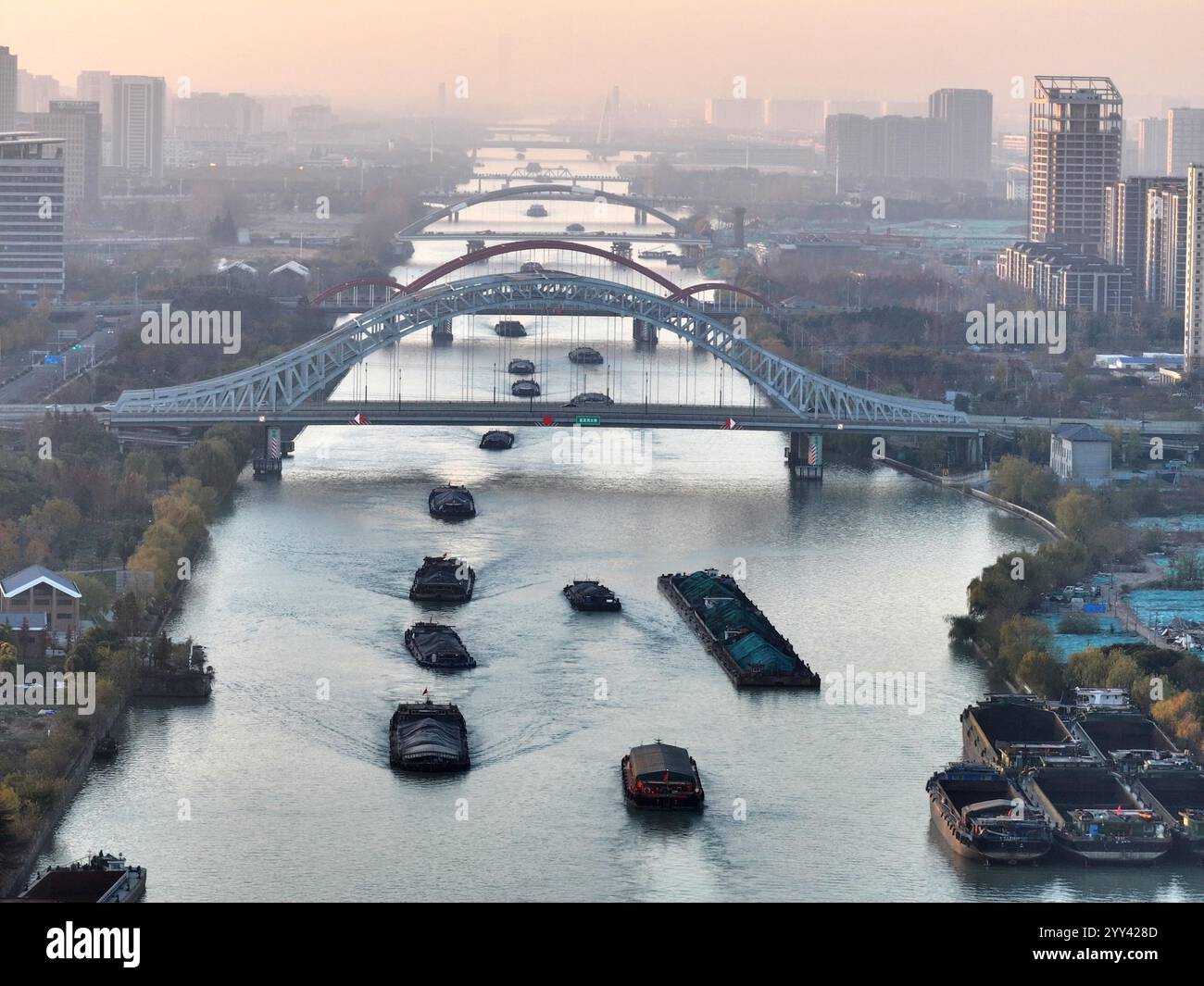 Aerial photo shows cargo ships sailing in the Grand Canal in Yangzhou ...