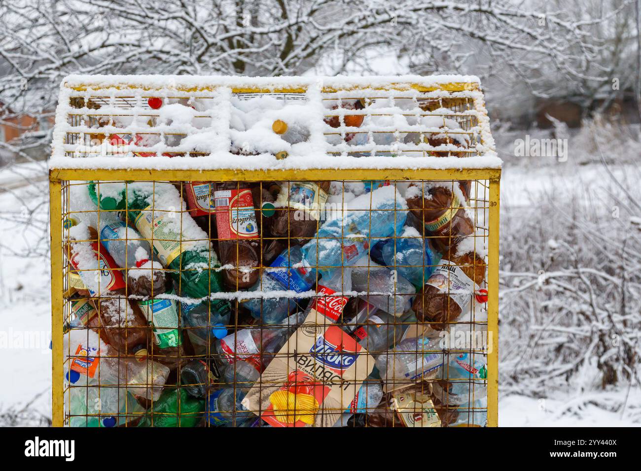 Ukraine, city of Romny, December 26, 2022: Plastic bottles in a trash ...