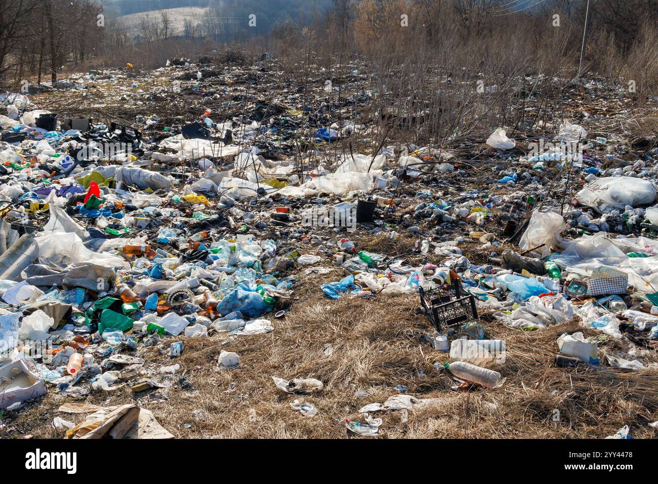 A natural dumping ground for garbage, used plastic bottles, bags and ...