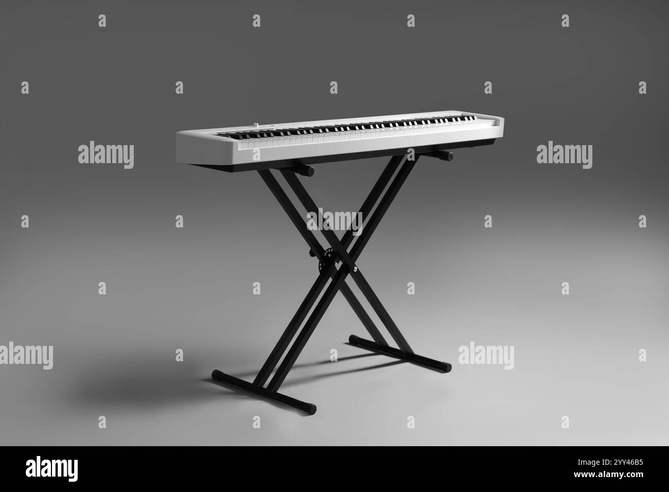 Synthesizer on grey background. Electronic musical instrument Stock ...