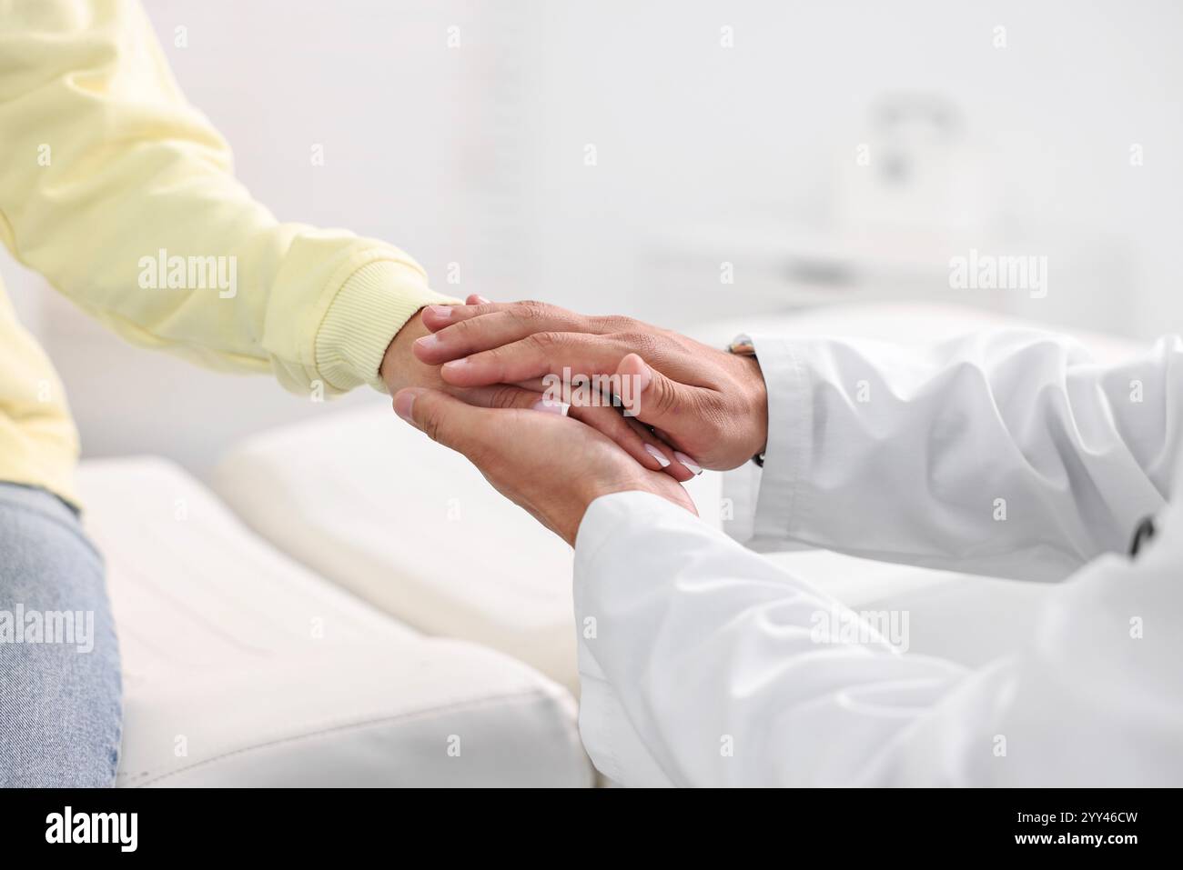 Healthcare worker supporting patient in hospital, closeup Stock Photo ...