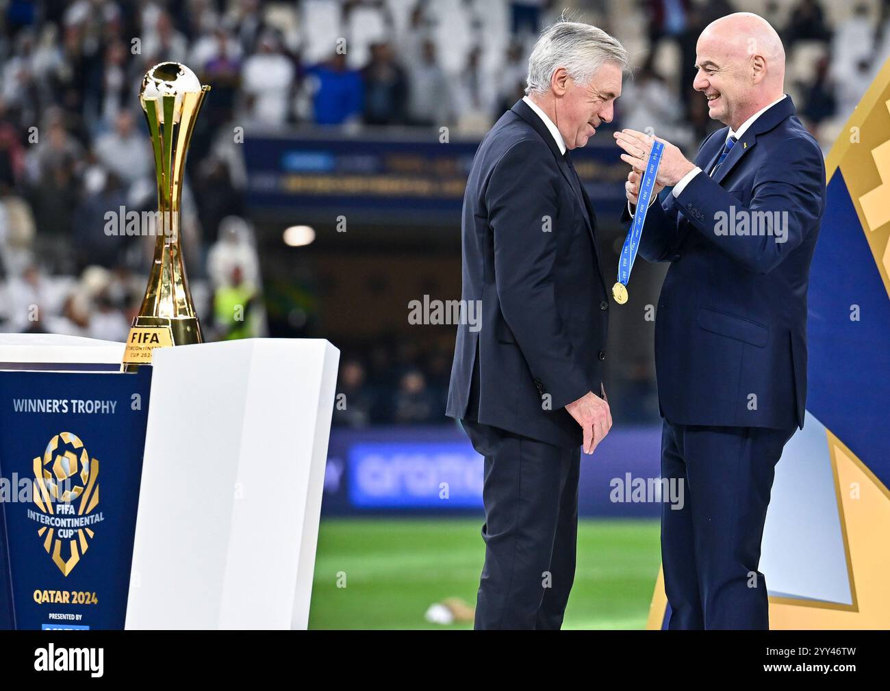 Lusail, Qatar. 18th Dec, 2024. FIFA President Gianni Infantino (R ...