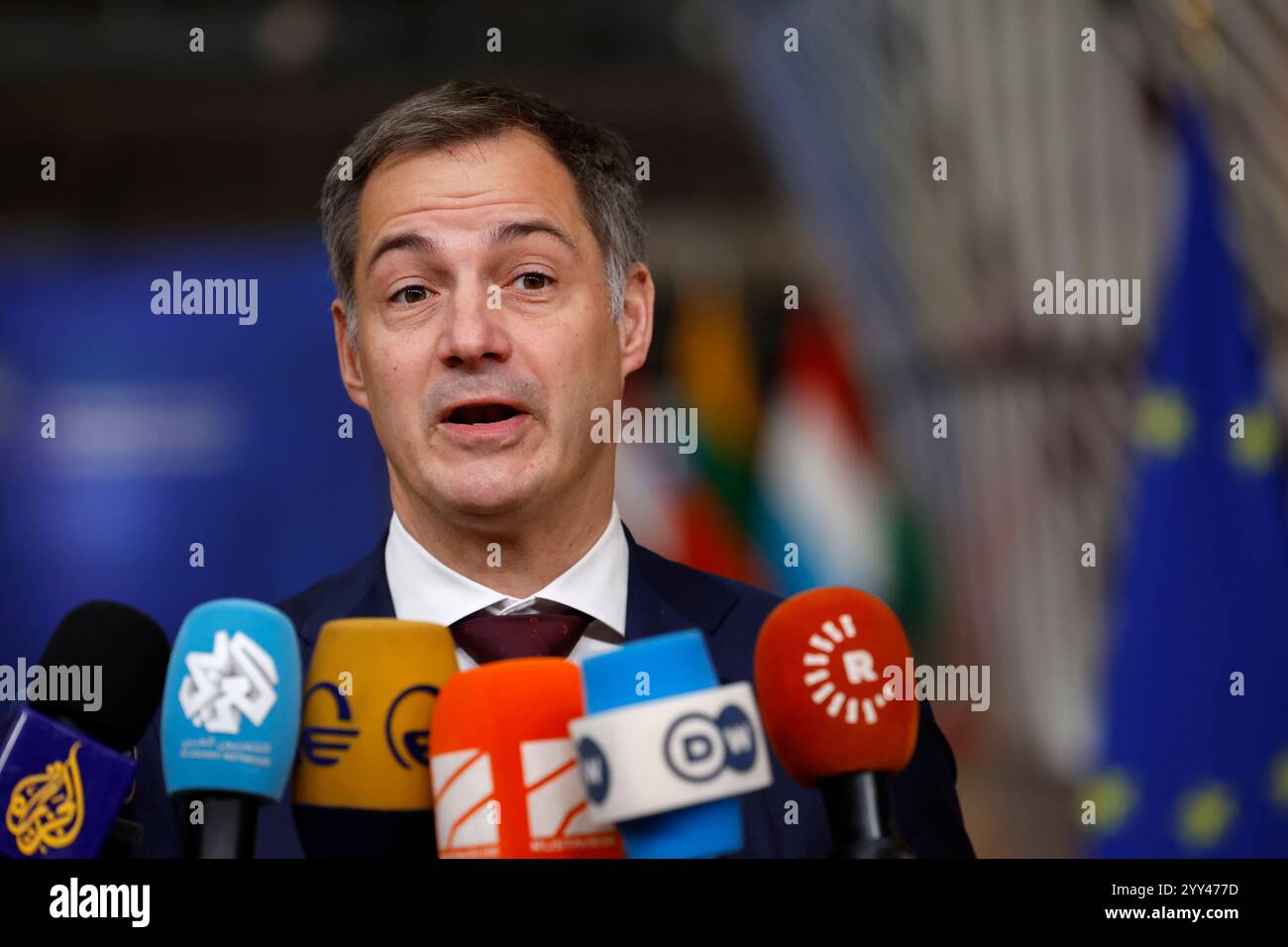 Belgium's Prime Minister Alexander De Croo speaks with the media as he ...