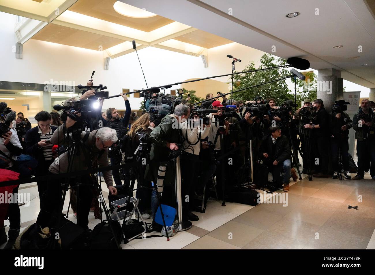 Members of the media wait inside the Avignon courthouse, southern ...