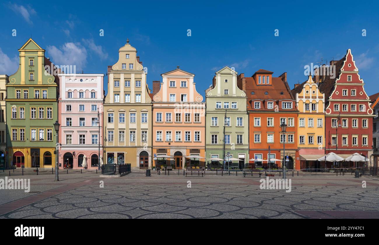 Colorful facades line the square in Wroclaw, Poland, inviting visitors ...