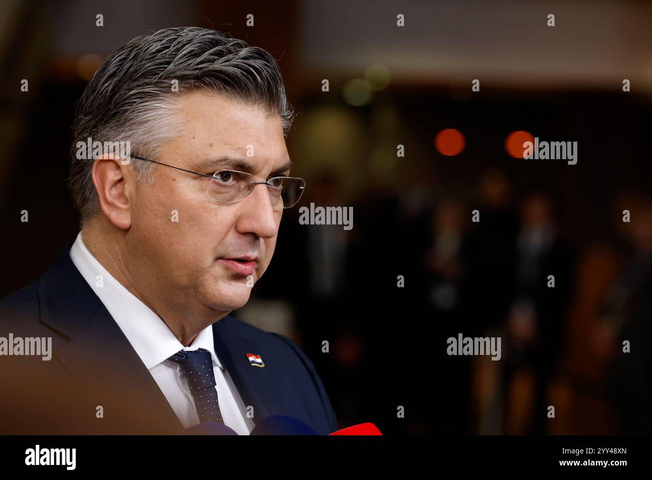 Croatia's Prime Minister Andrej Plenkovic speaks with the media as he ...