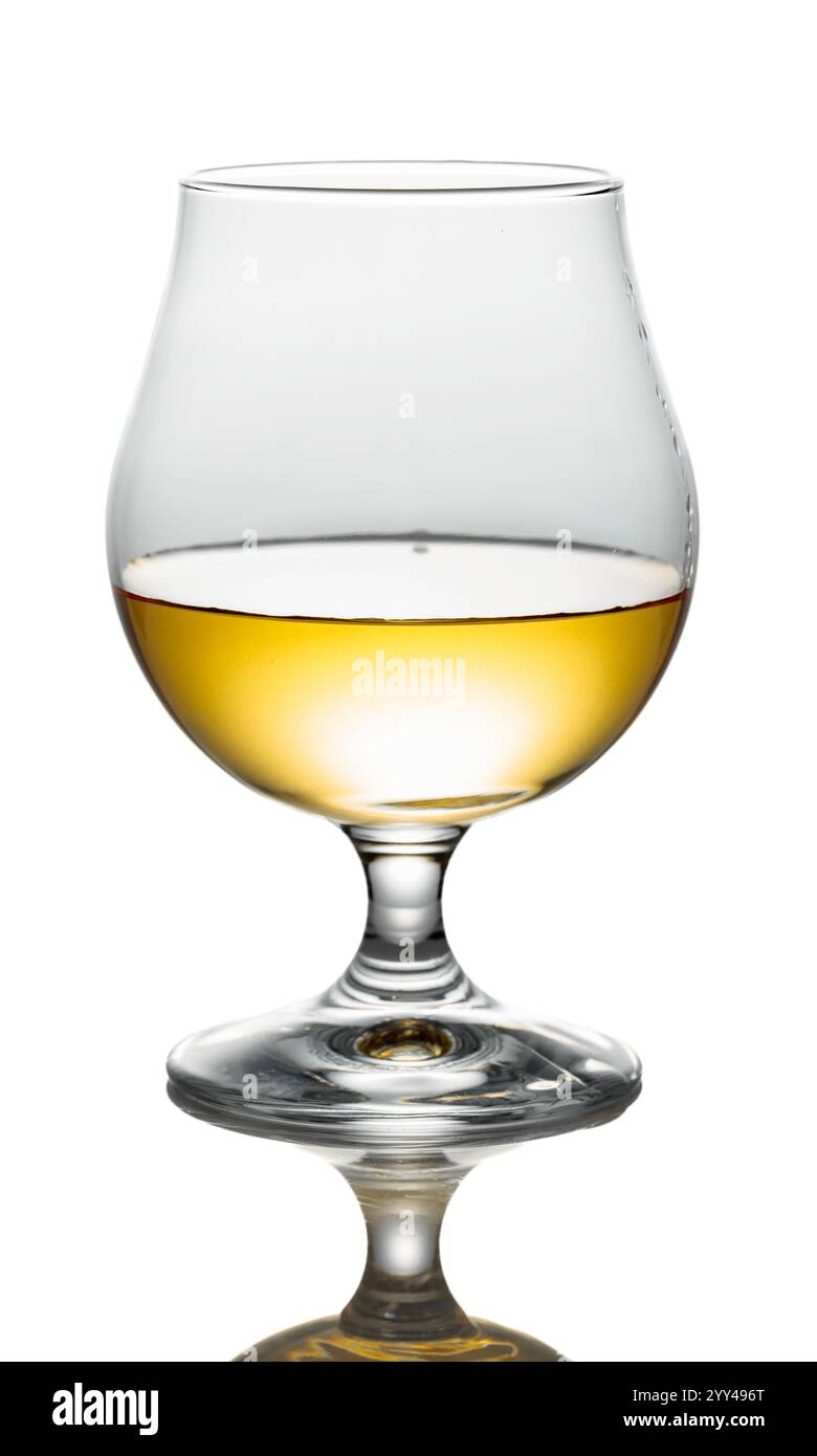Brandy in a snifter. Isolated on a white background Stock Photo - Alamy