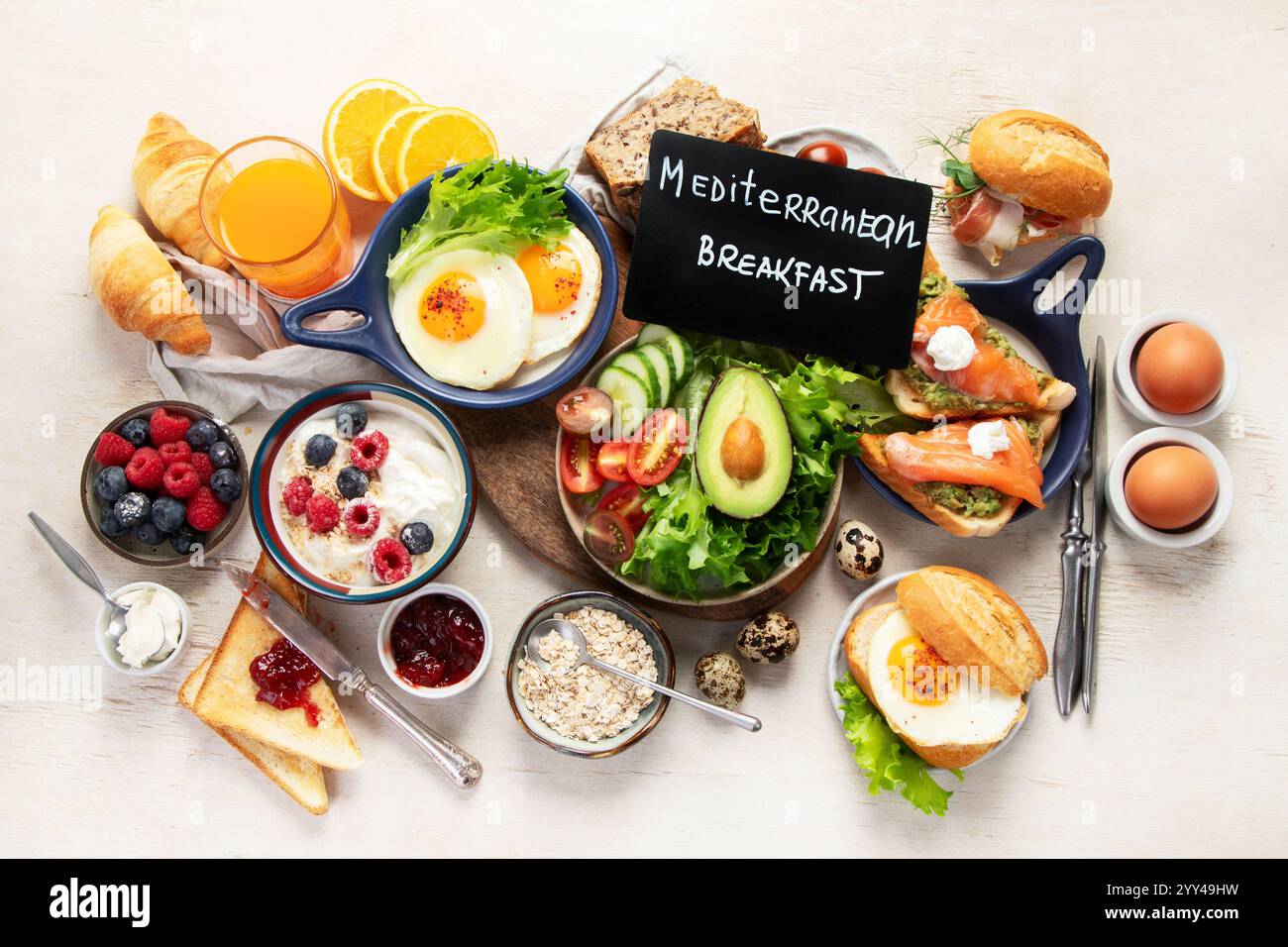 Breakfast food table. Huge healthy breakfast spread on a table with ...