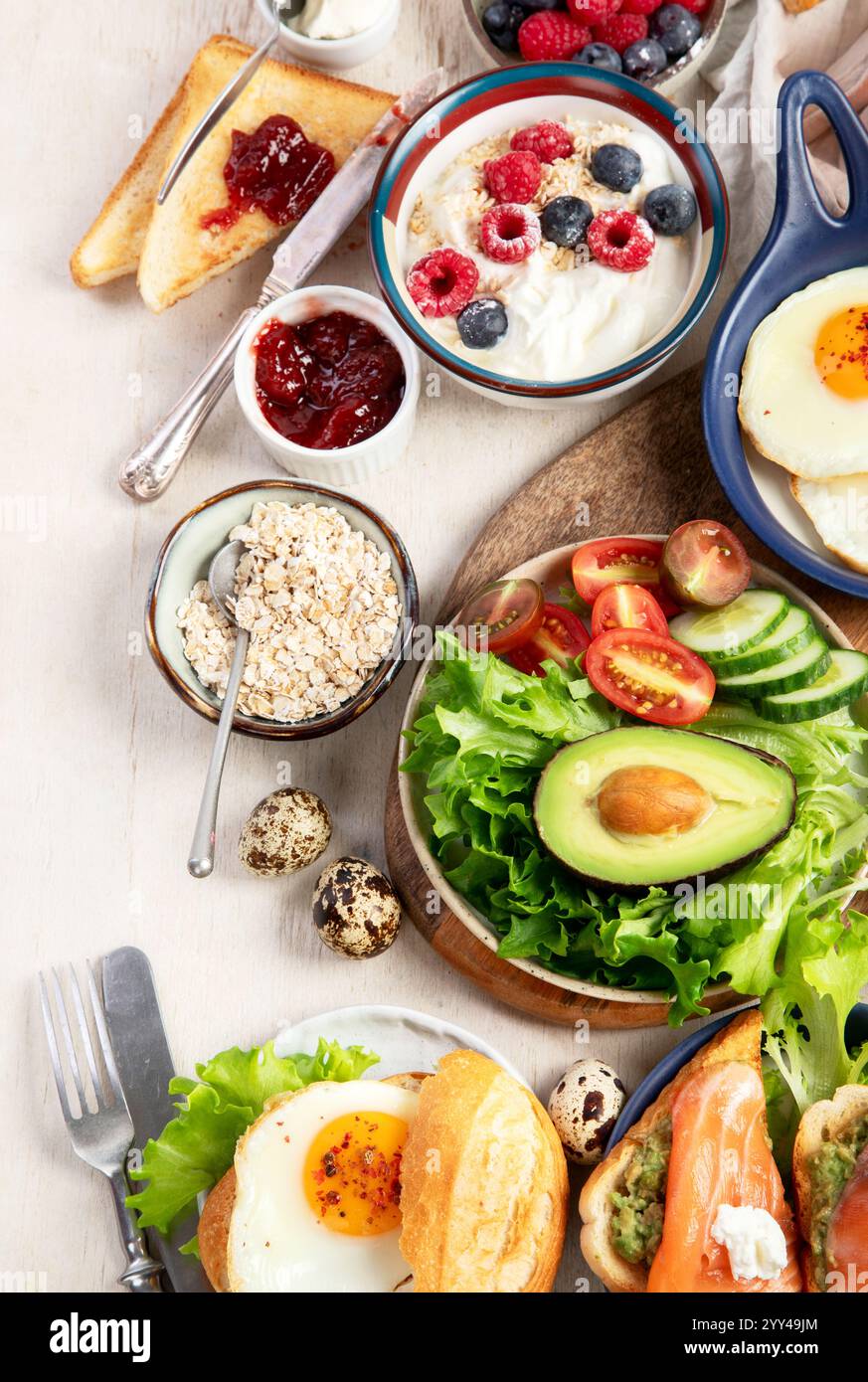 Breakfast food table. Huge healthy breakfast spread on a table with ...