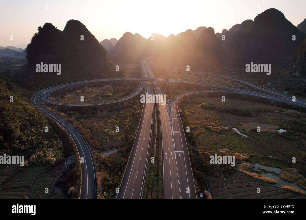 Vehicles drive on the Hongling interconnecting section of a expressway ...
