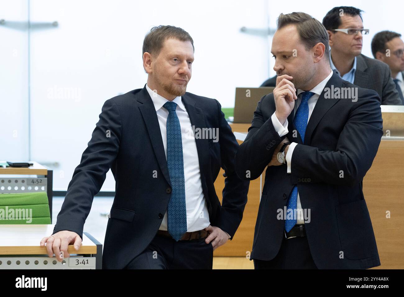 Dresden, Germany. 19th Dec, 2024. Michael Kretschmer (l), Prime ...