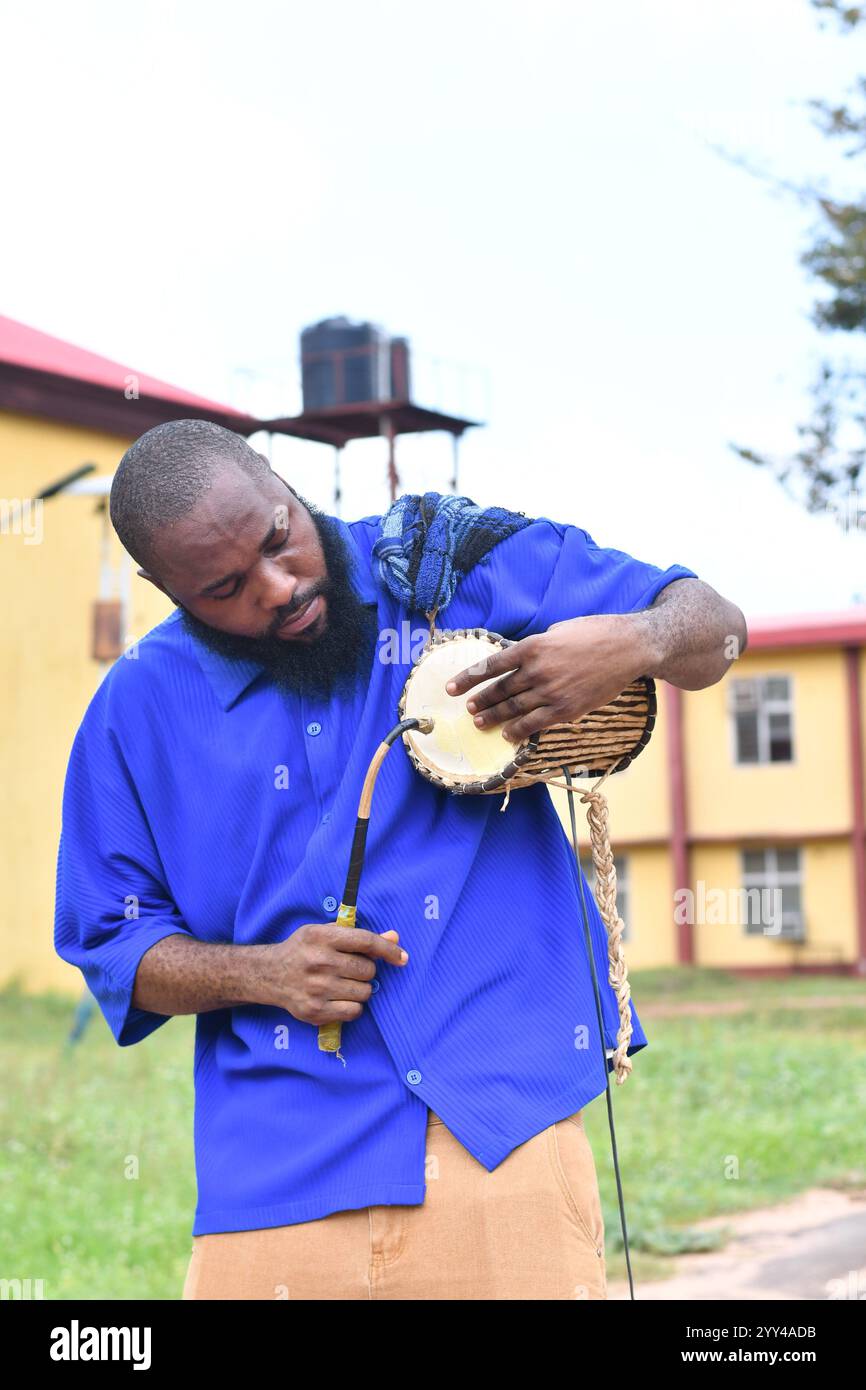 Cheerful guy playing drums hi-res stock photography and images - Alamy