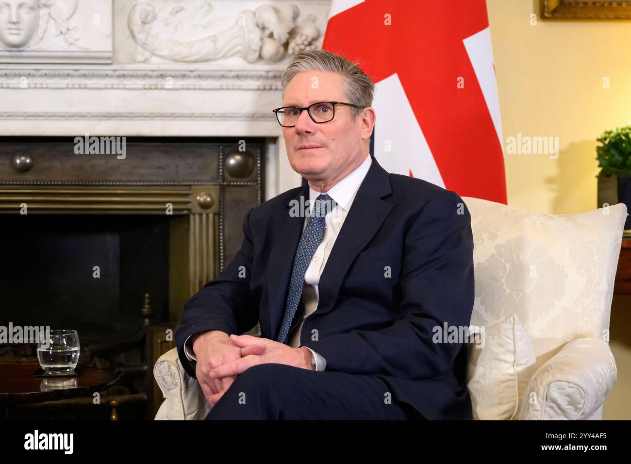 Britain's Prime Minister Keir Starmer speaks with the Sultan of Brunei ...