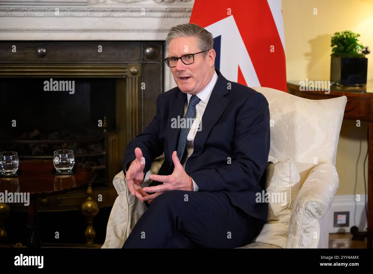 Britain's Prime Minister Keir Starmer speaks with the Sultan of Brunei ...