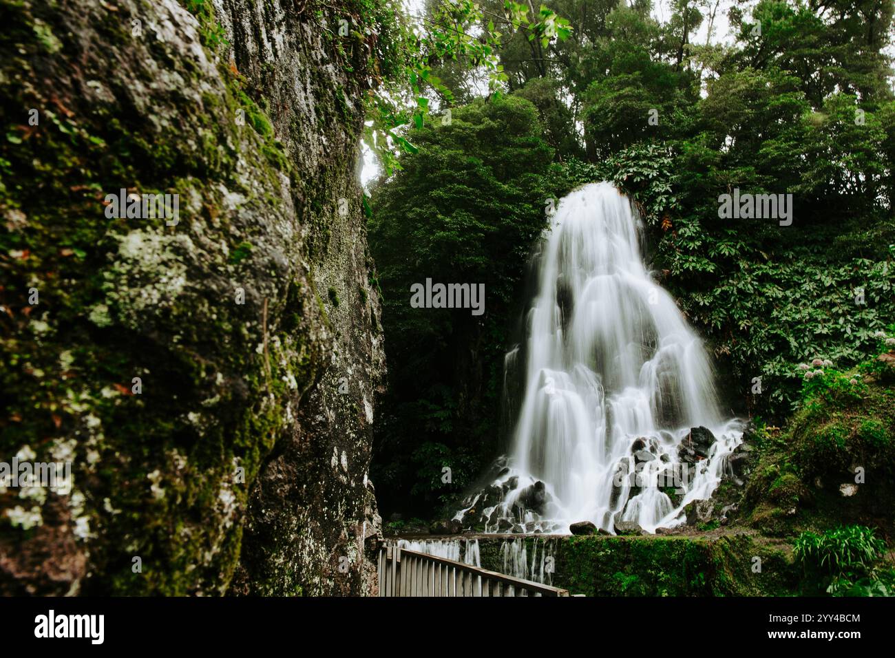 Waterfall with green landscape around, Azores nature, explore Portugal ...