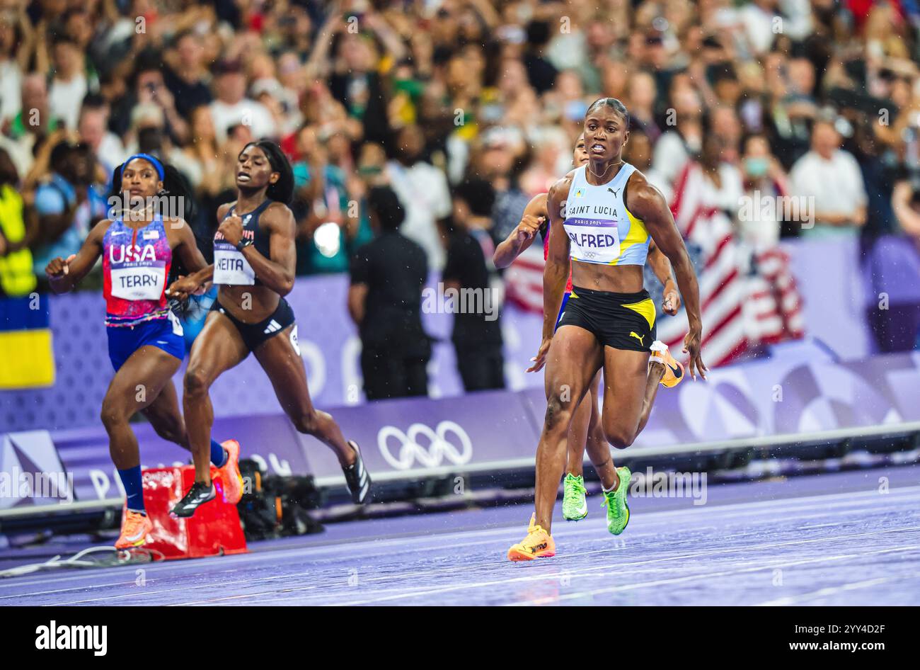 Julien Alfred winning in the 100 meters relay at the Paris 2024 Olympic ...