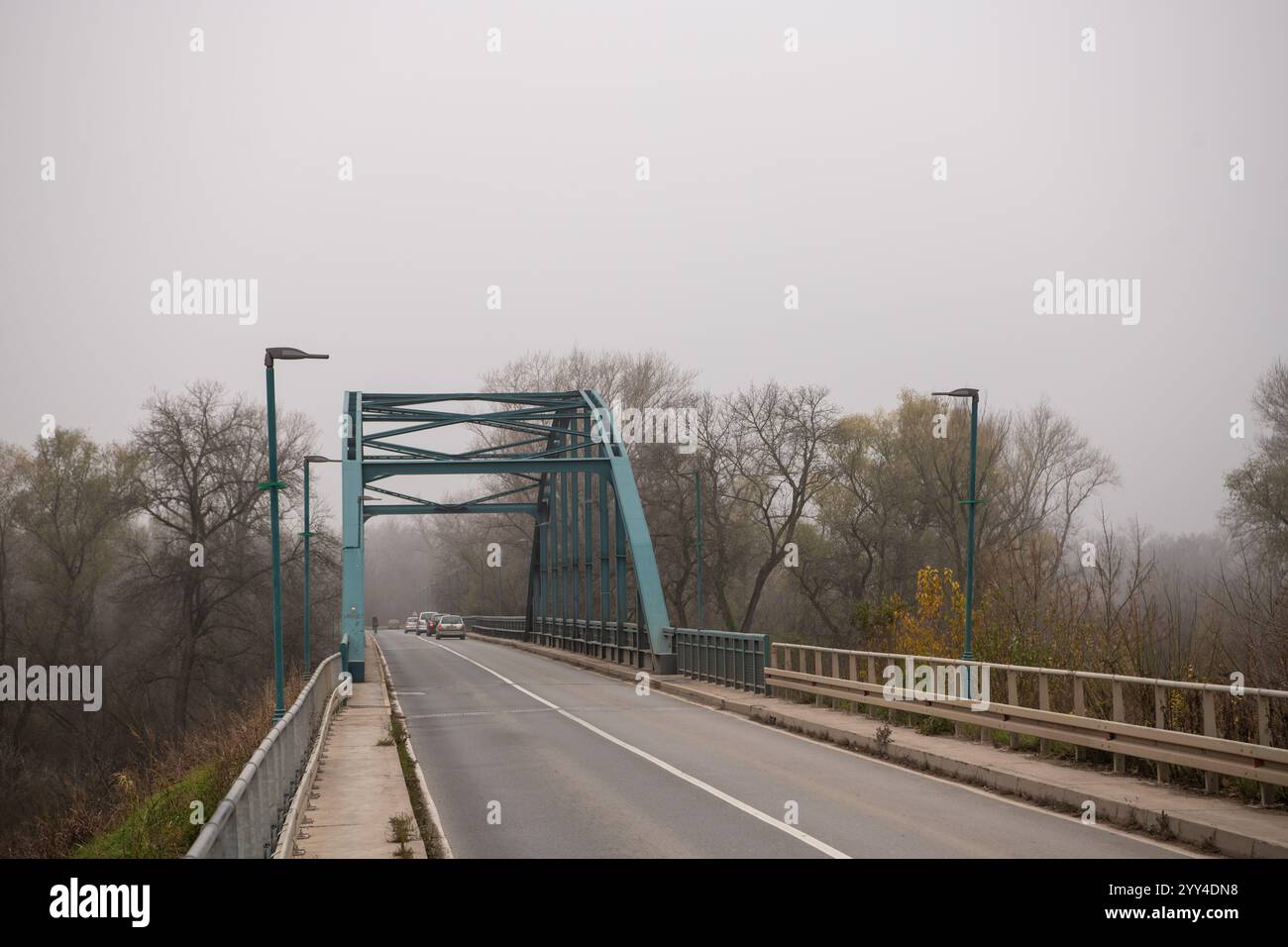 A bridge in Pancevo across the river Tamis. Cars crossing the bridge ...