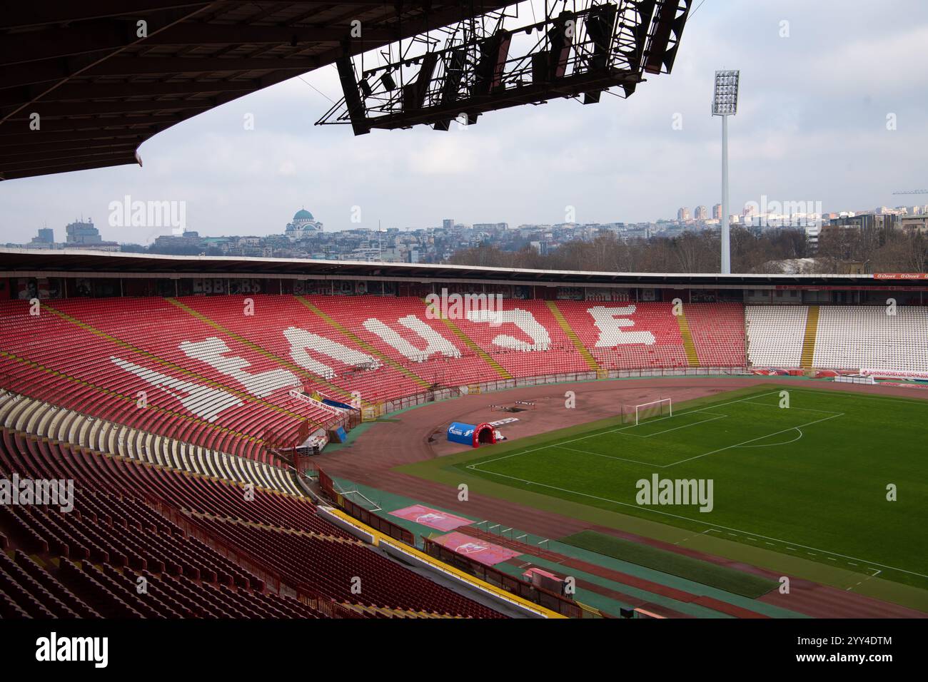 Football club Red Star Belgrade empty stadium. Delije sector and city ...