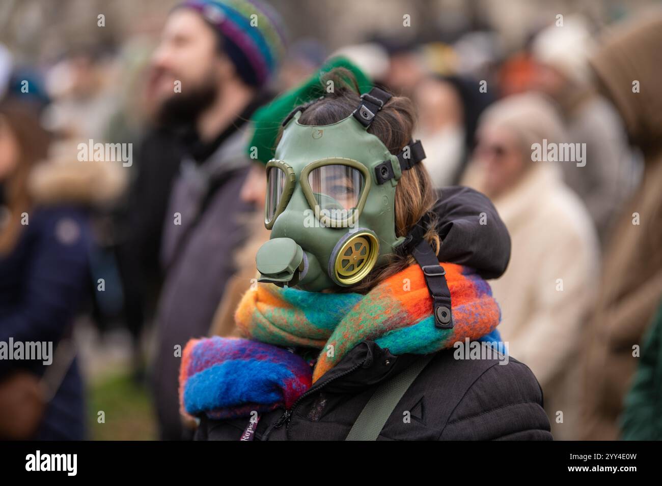 Environmental protests. Woman with gas mask on protest against air ...