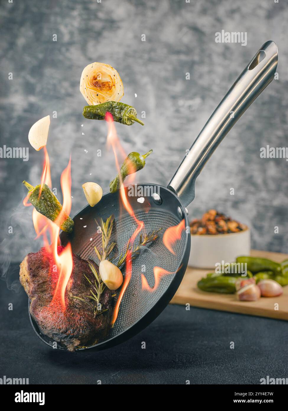 A mesmerizing culinary composition featuring sizzling beef ignited with ...