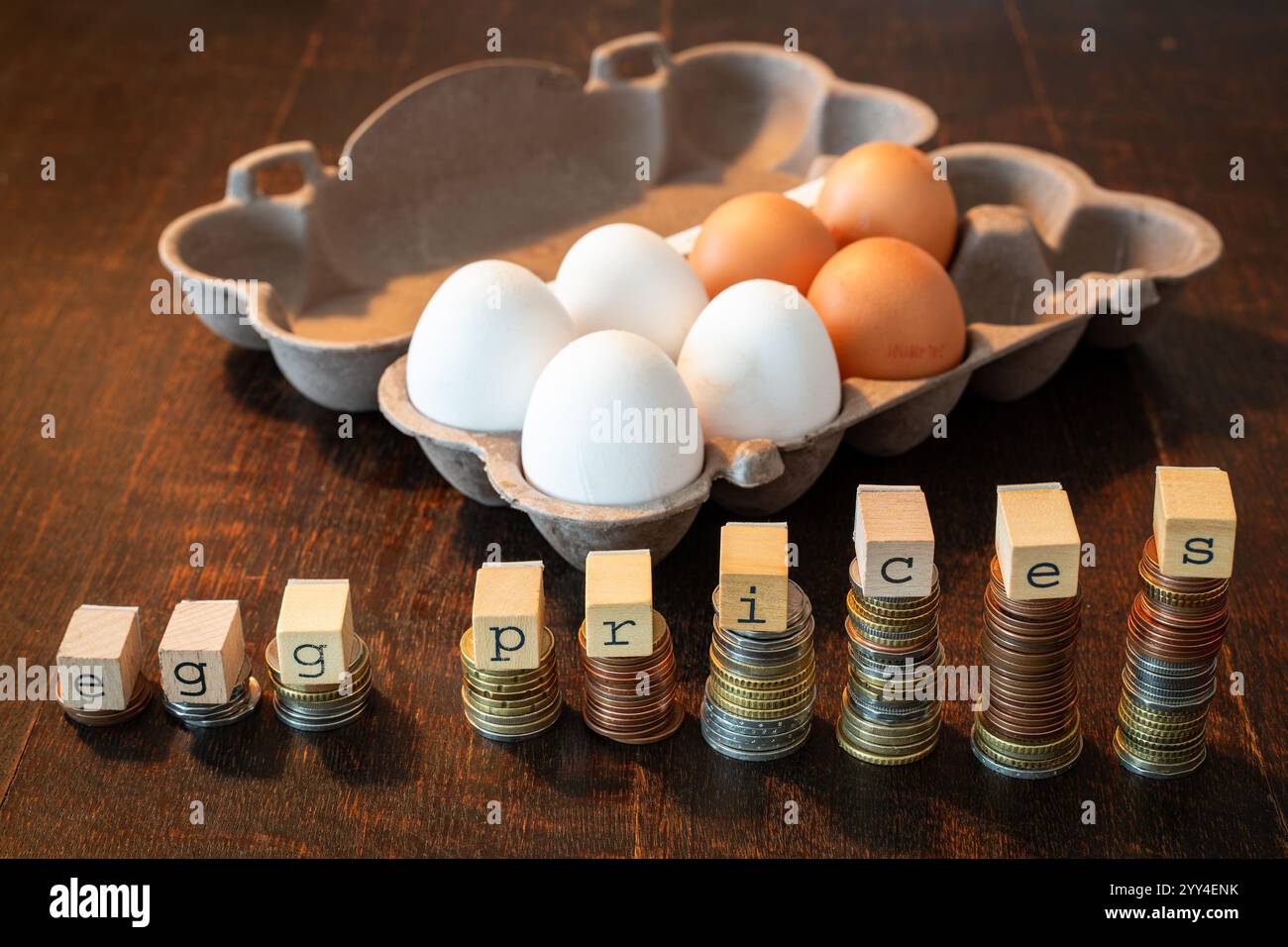 Rising Egg Prices, Fresh Chicken Eggs in Carton with Stacked Coins ...
